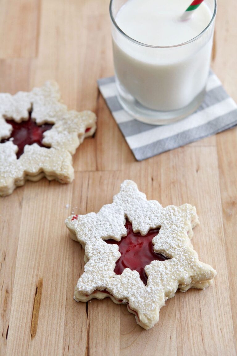 Snowflake-shaped Raspberry Linzer Cookies